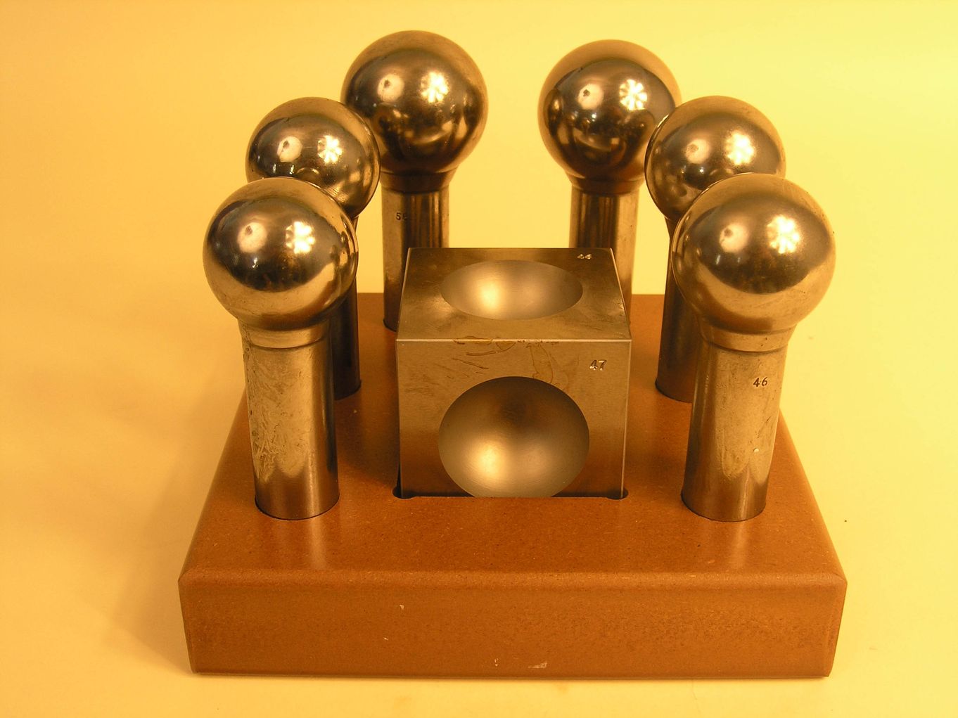 Doming Blocks and Punches